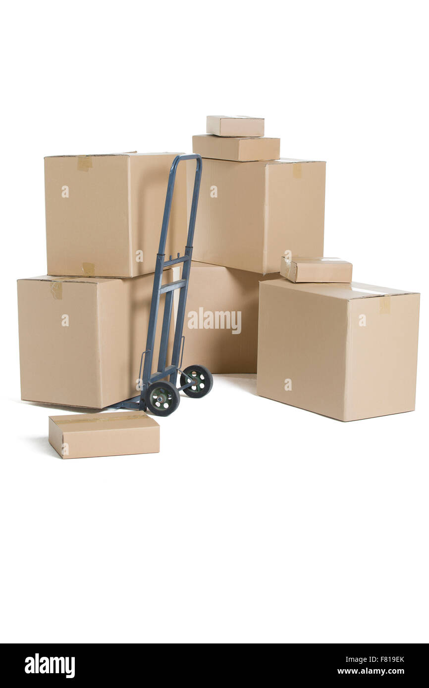 Cardboard boxes and cart Stock Photo - Alamy