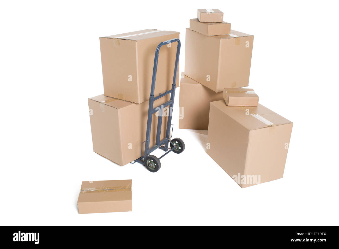 Cardboard boxes and cart Stock Photo - Alamy