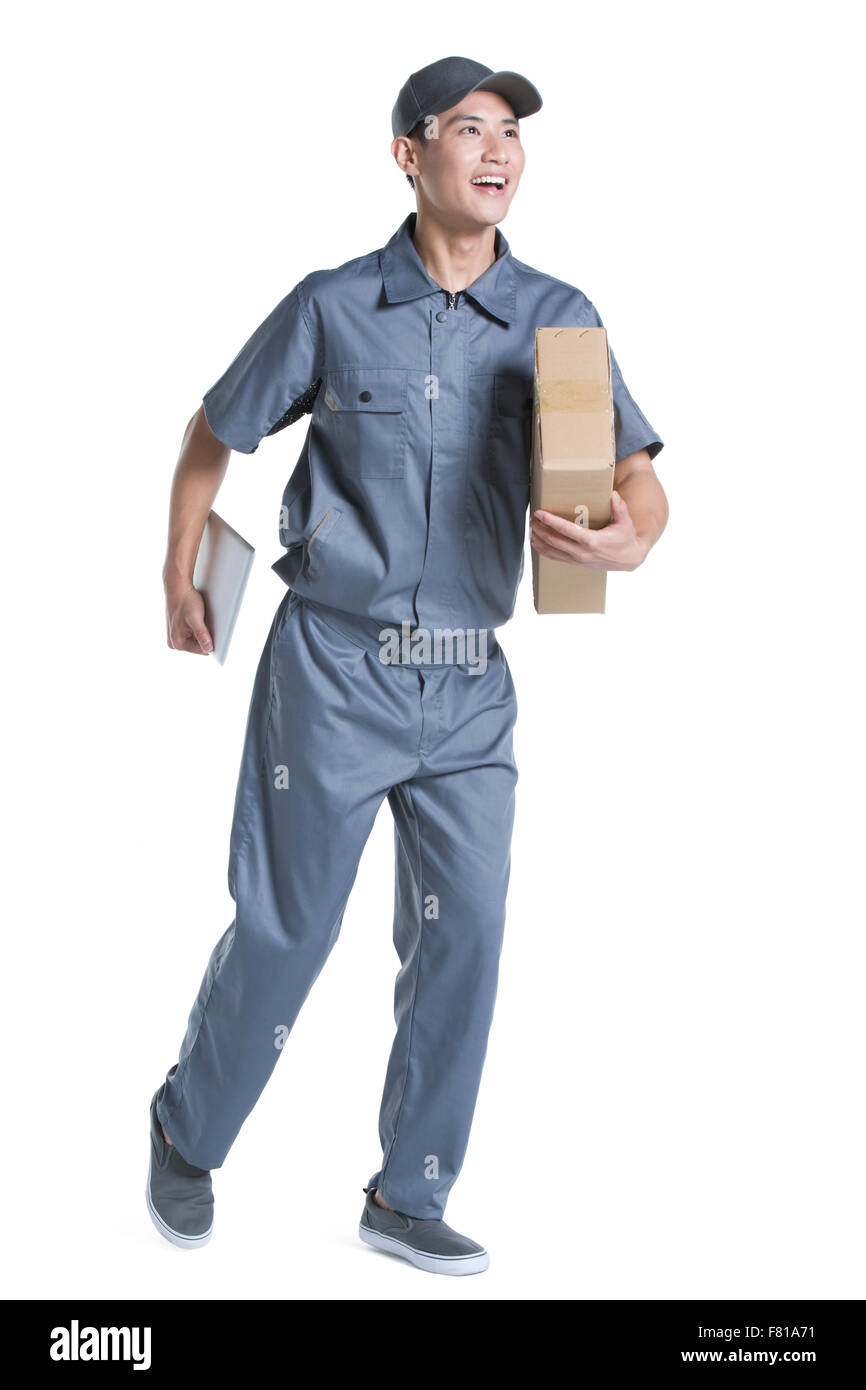 Delivery person delivering package Stock Photo - Alamy