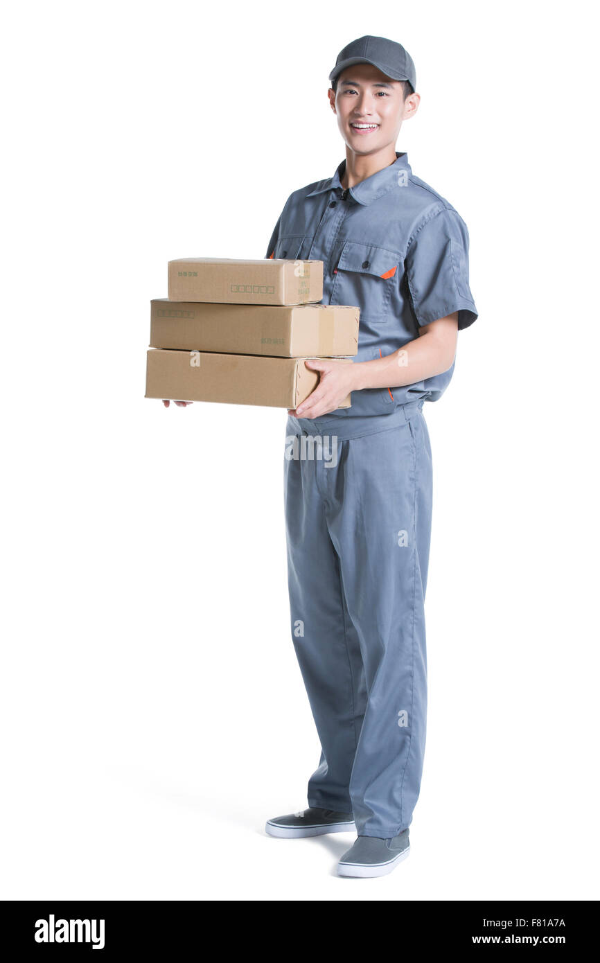 Delivery person delivering package Stock Photo - Alamy