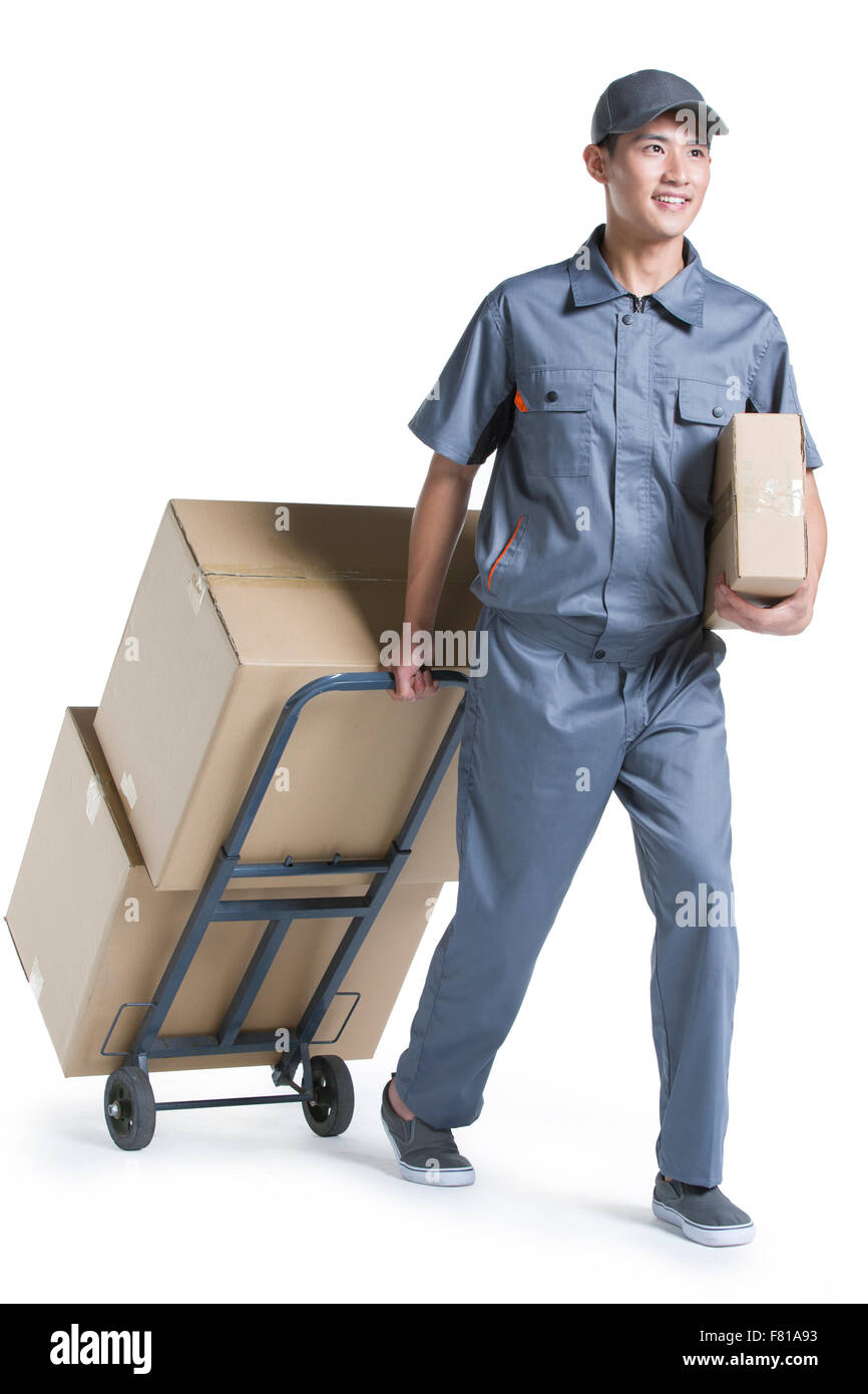 Delivery person delivering package Stock Photo - Alamy