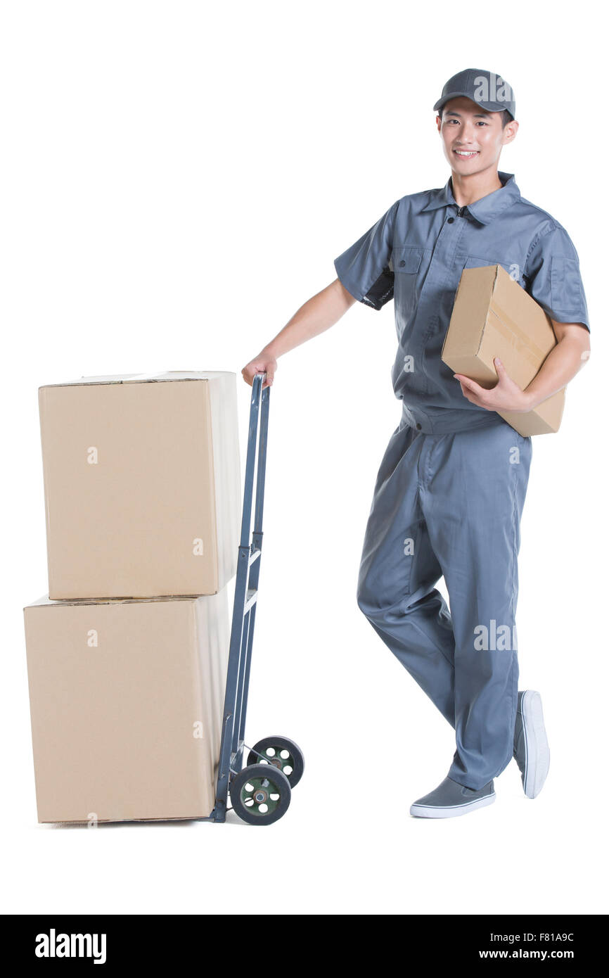 Delivery person delivering package Stock Photo - Alamy