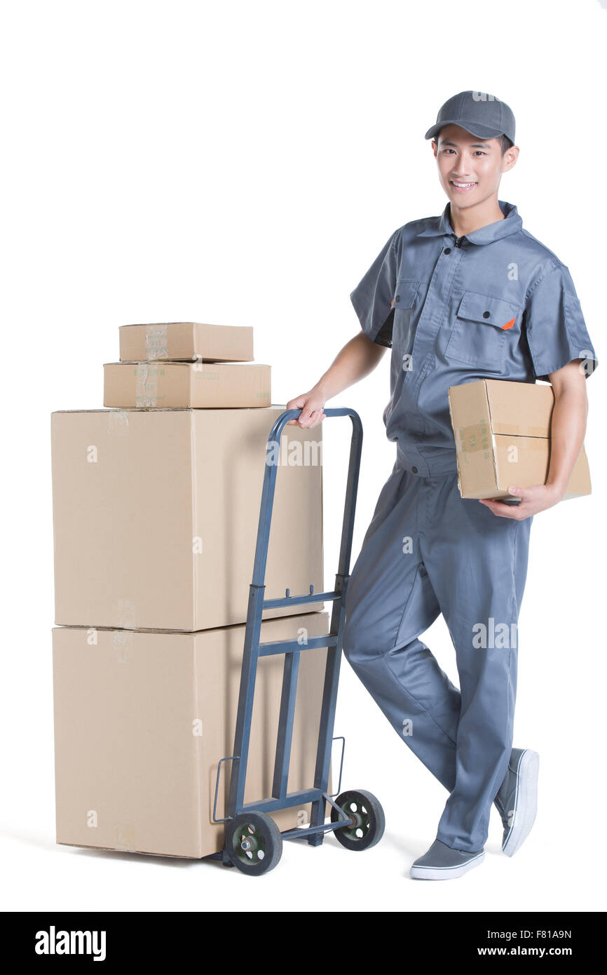 Delivery person delivering package Stock Photo - Alamy