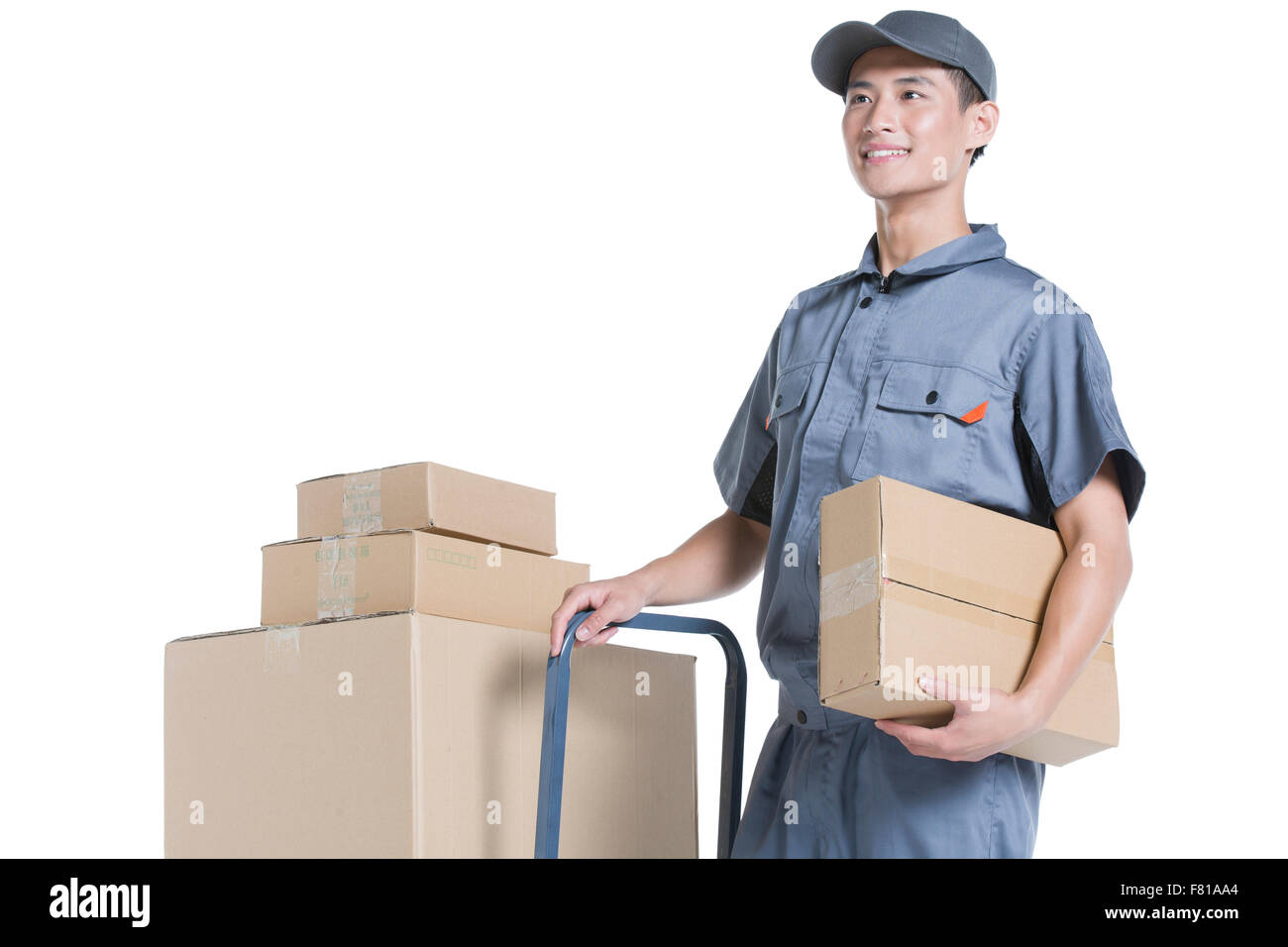 Delivery person delivering package Stock Photo - Alamy