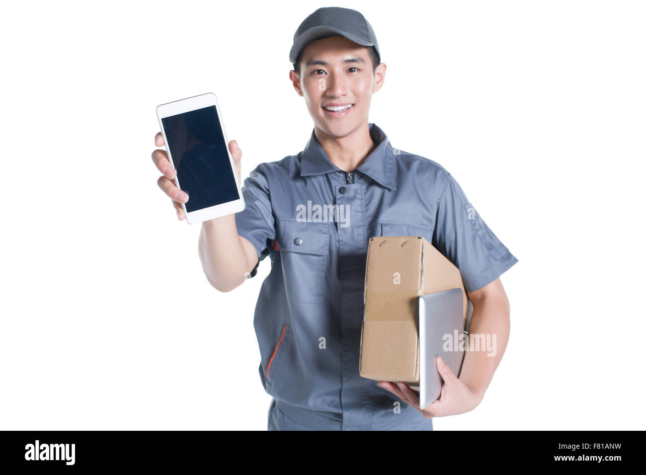Delivery person showing smart phone Stock Photo - Alamy