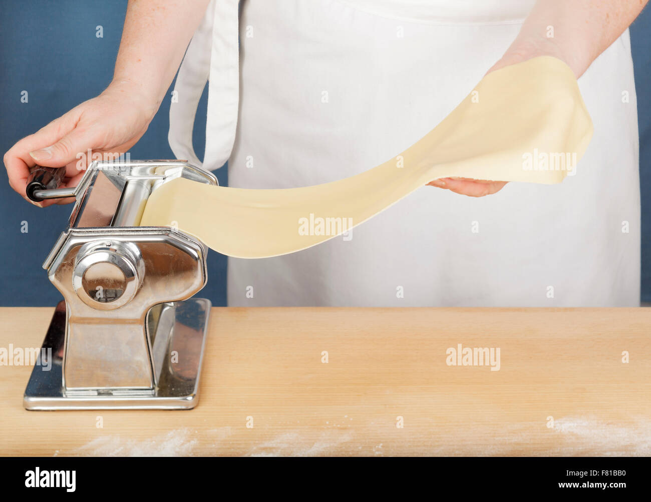 Hands rolling pasta hi-res stock photography and images - Alamy