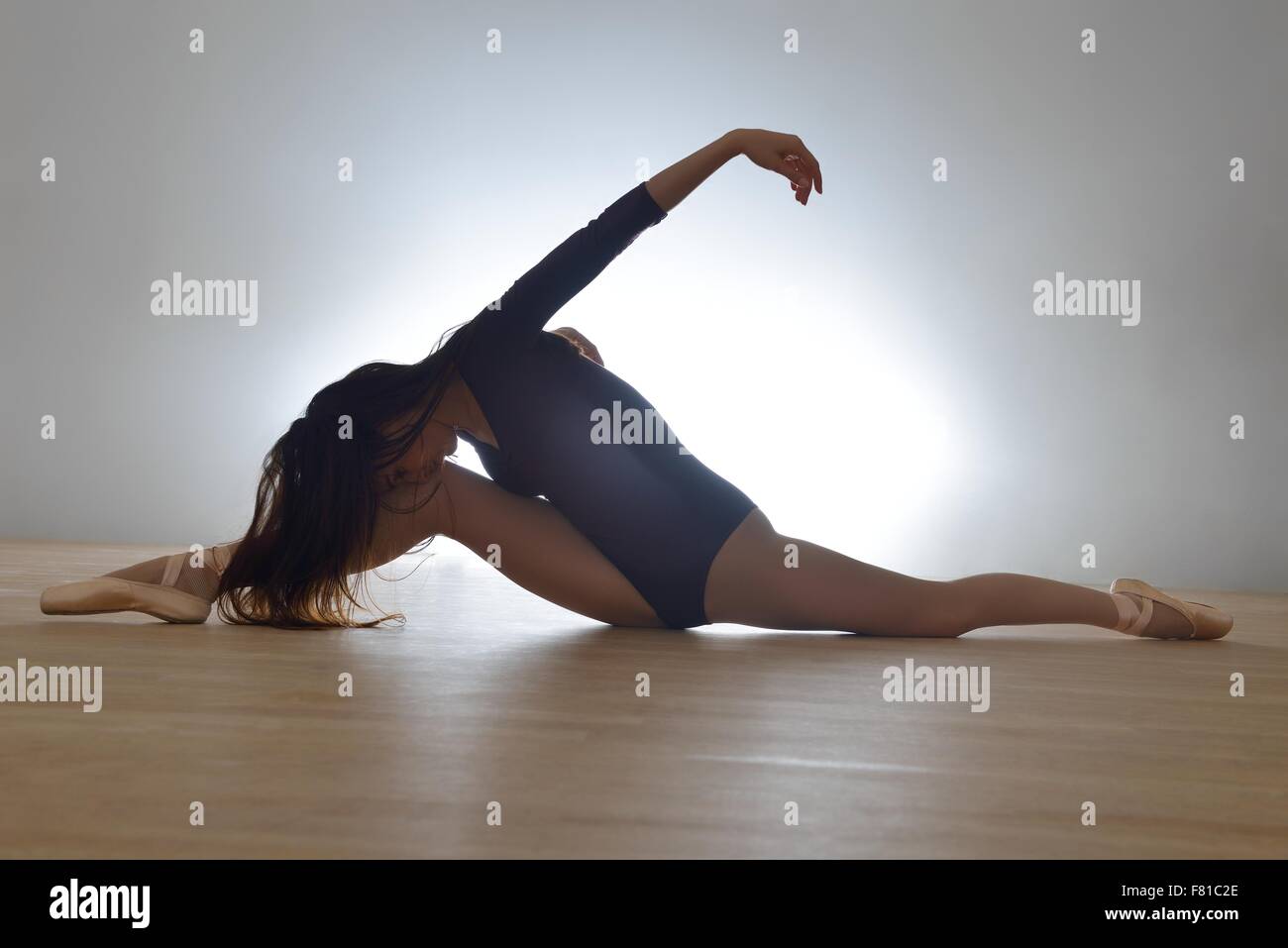 modern style ballet dancer posing and jumping on training Stock Photo ...
