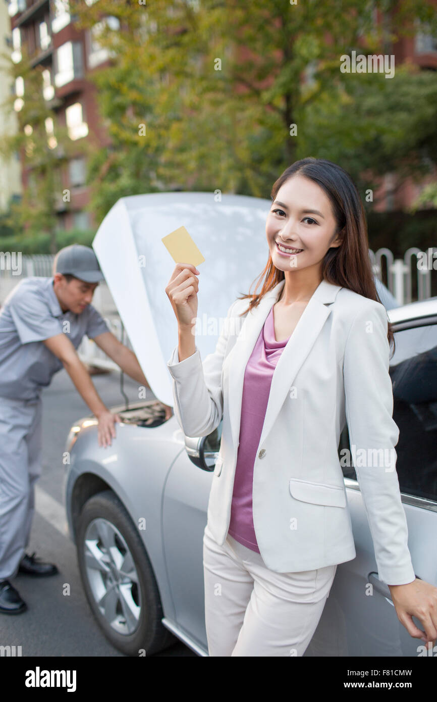 Auto mechanic and car owner Stock Photo - Alamy