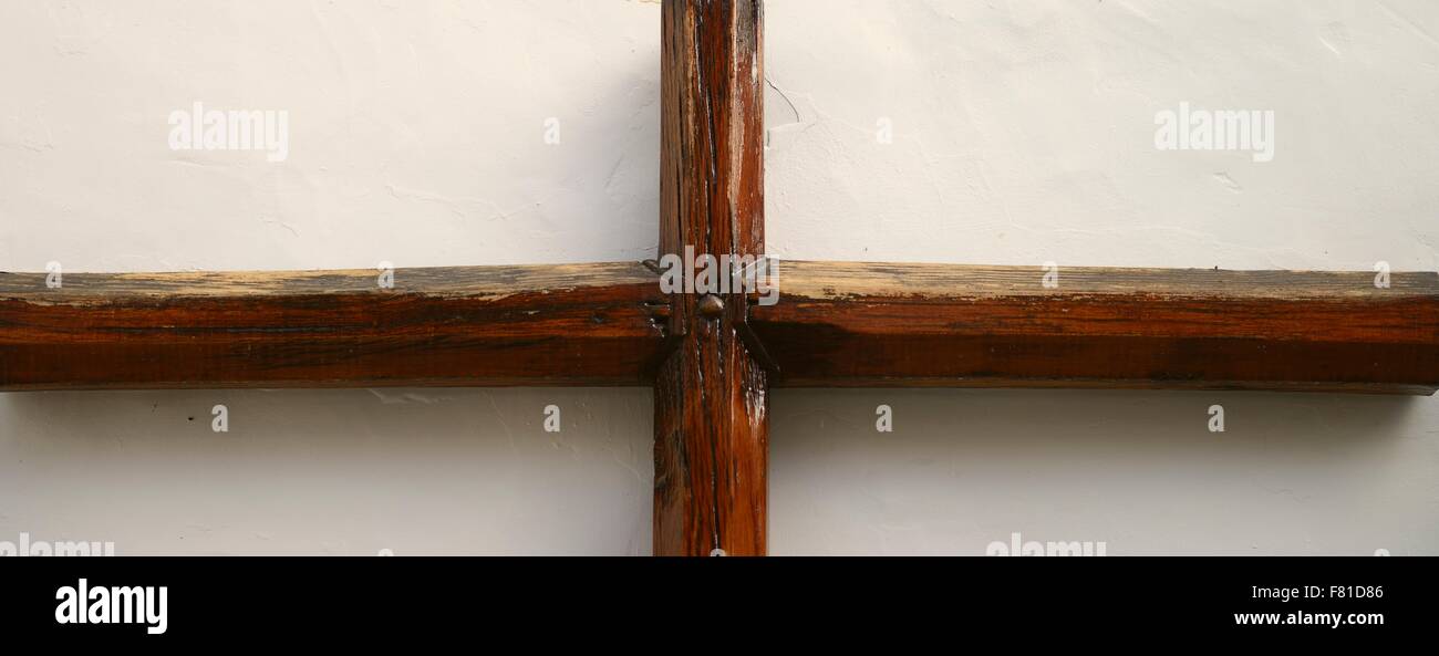wooden cross on beige background Stock Photo - Alamy