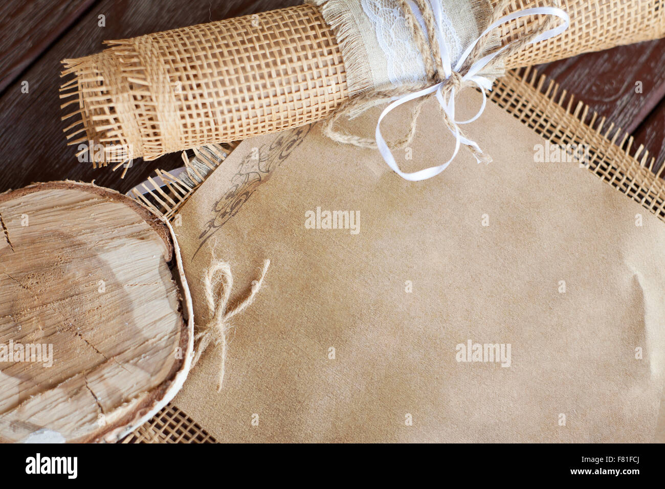 wedding invitation on parchment paper and wooden whetstone Stock Photo ...