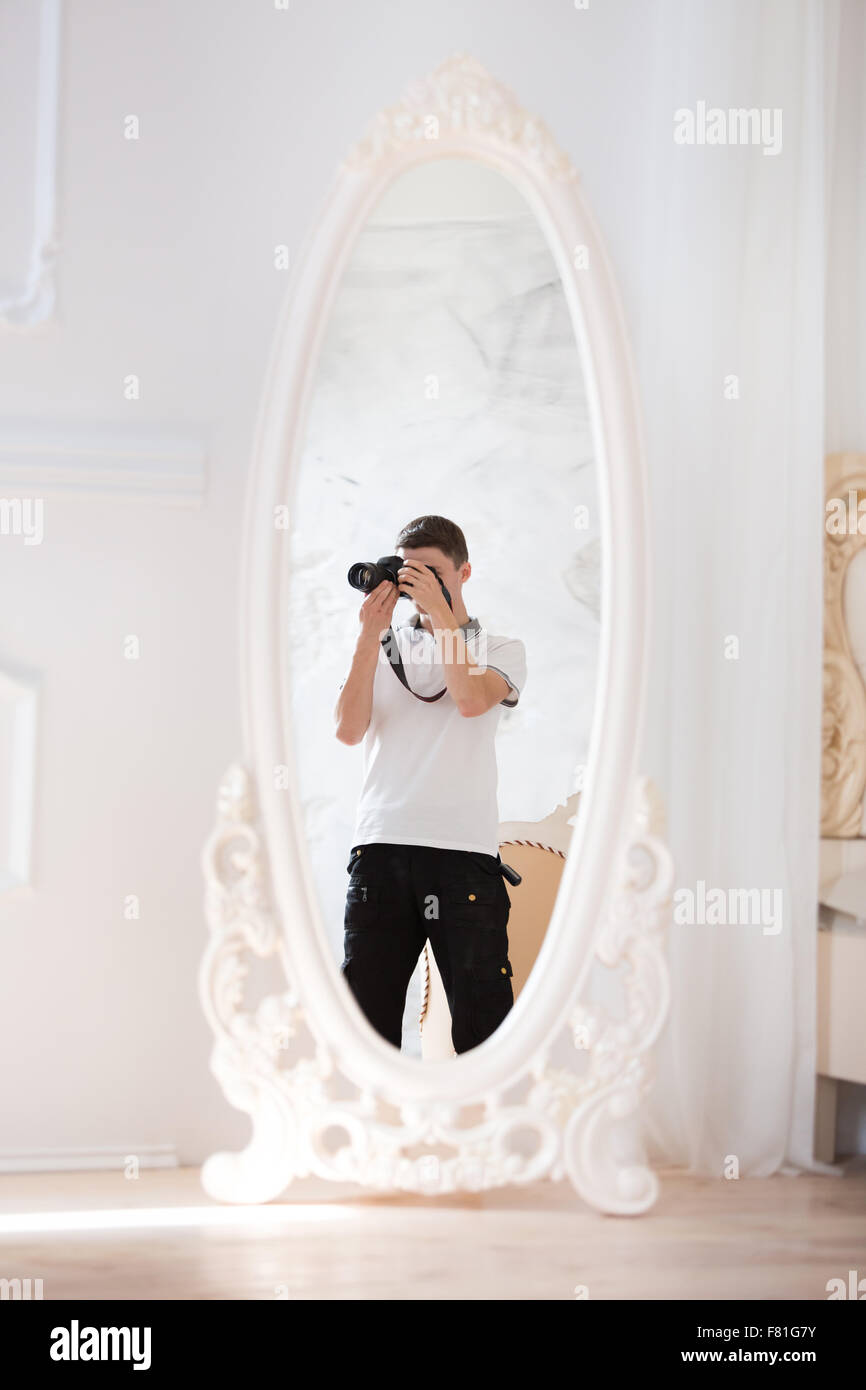 Interior with hand mirror self portrait hi-res stock photography and ...