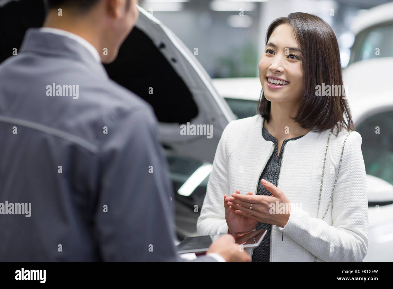 Young repairman standing tablet talking hi-res stock photography and ...