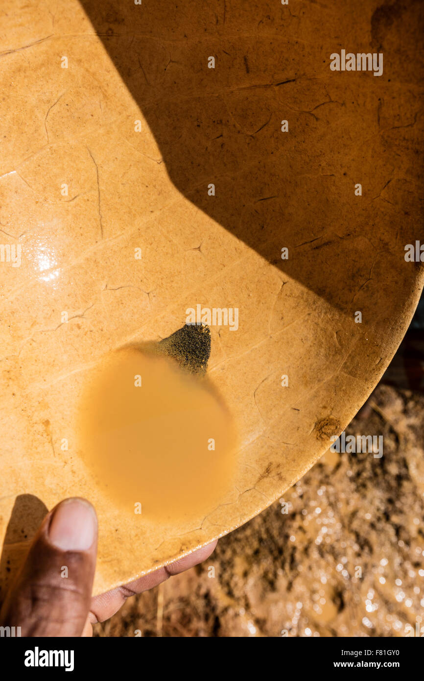 gold dust collected by gold digger Stock Photo - Alamy