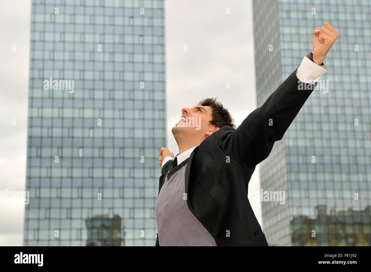 Photo of happy winner businessman screaming from joy Stock Photo - Alamy