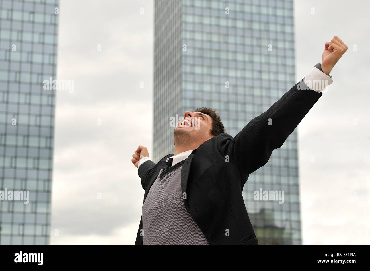 Photo of happy winner businessman screaming from joy Stock Photo - Alamy