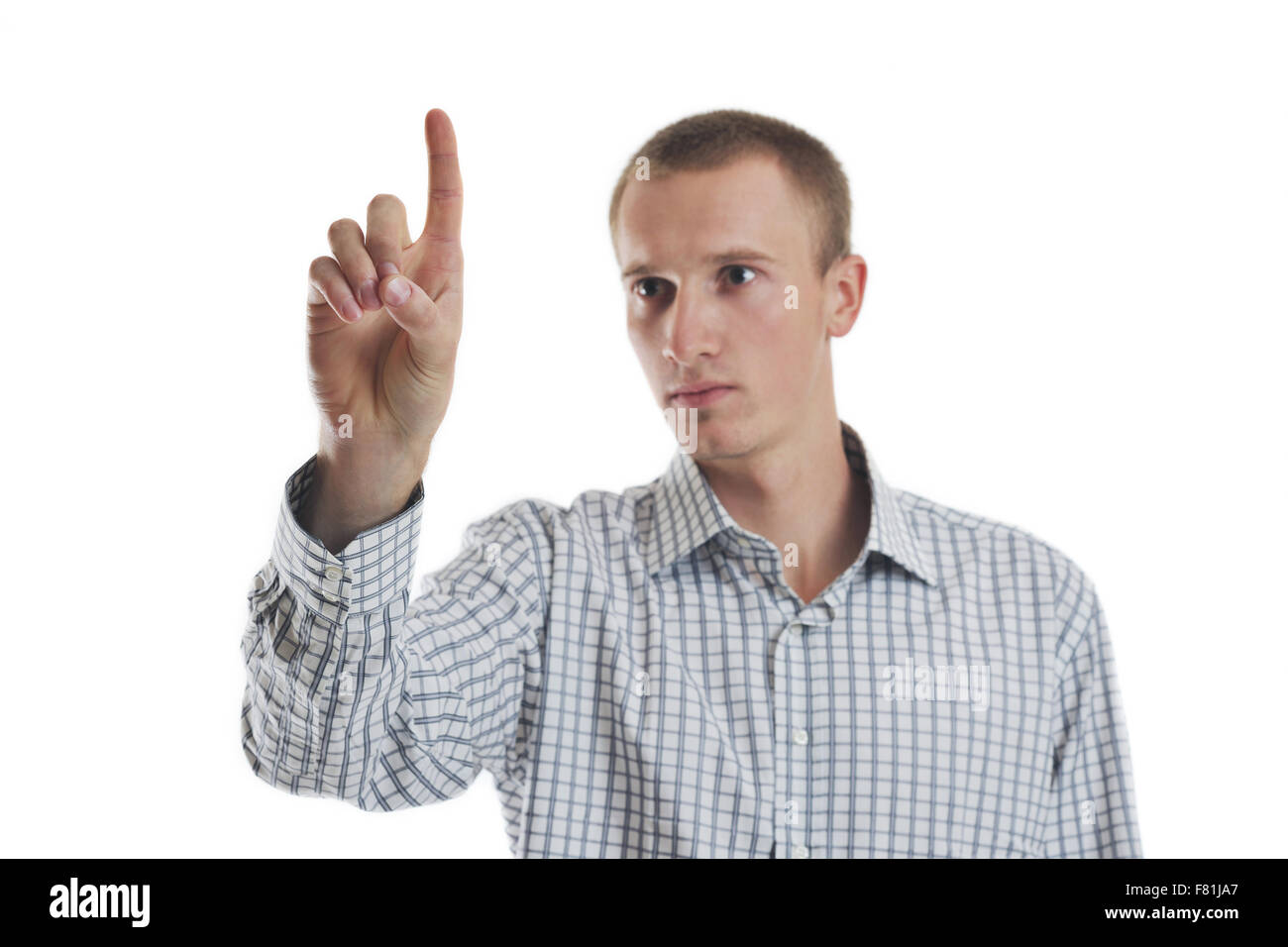 handsome young business man touching screen isolated on white bacground ...