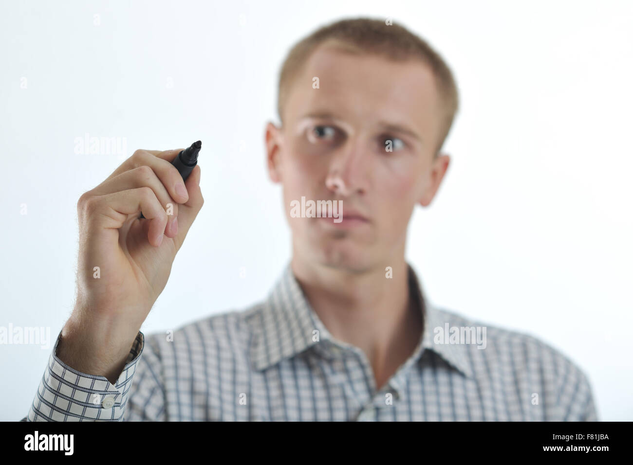 handsome young business man touching screen isolated on white bacground ...