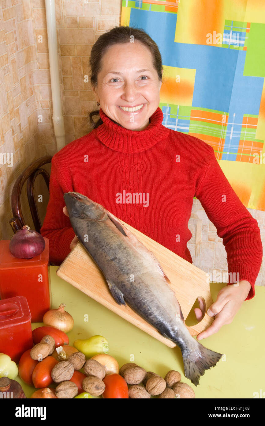 Woman salmon plate mature hi-res stock photography and images - Alamy