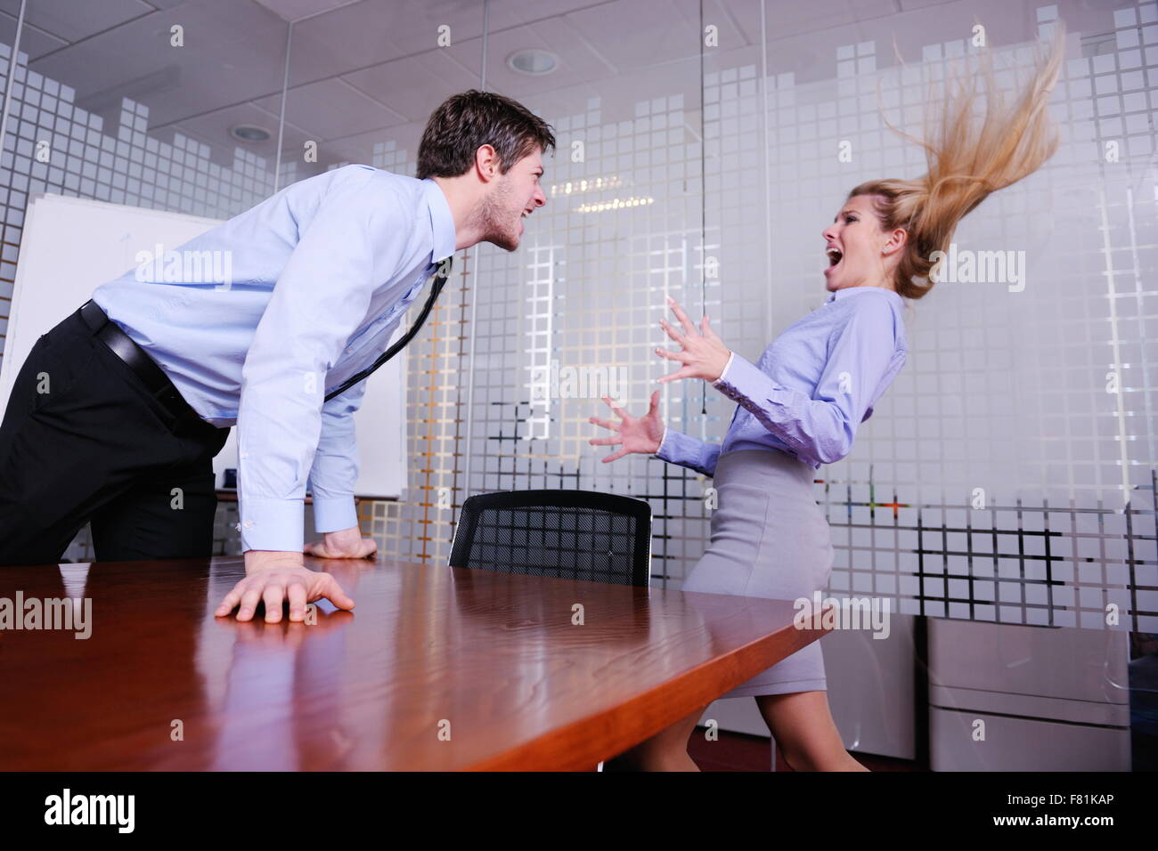 Angry business man screaming at employee in the office Stock Photo - Alamy