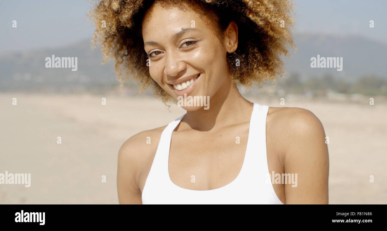 Female Looking And Smiling At Camera Stock Photo - Alamy