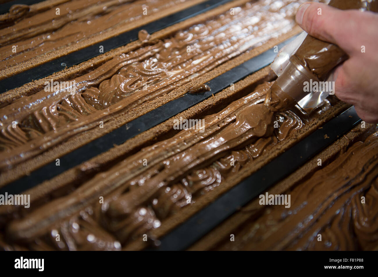 Pastry in his workshop preparing Chocolate Yule logs Stock Photo - Alamy