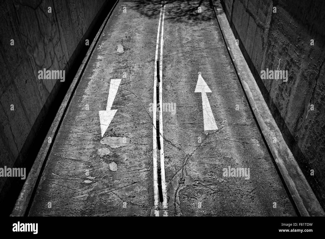 Arrows in road hi-res stock photography and images - Alamy