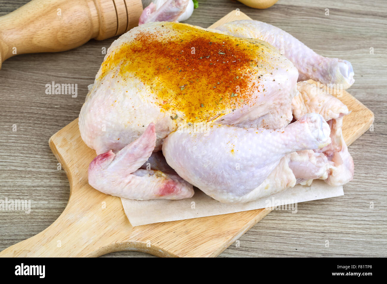 Raw chicken with spices ready for cooking Stock Photo - Alamy