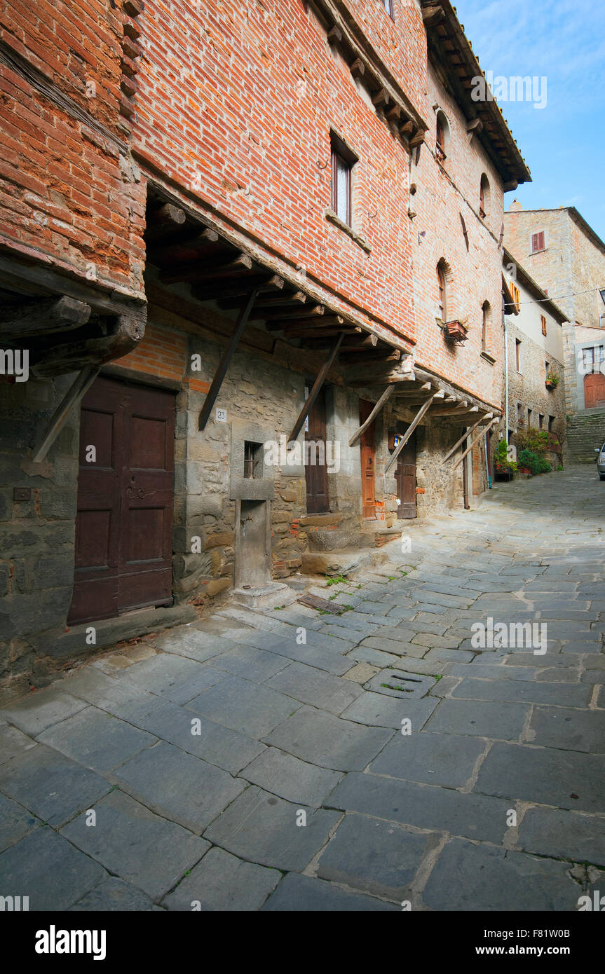 Medieval brick houses in Via Jannelli, Cortona, Tuscany, Italy Stock ...