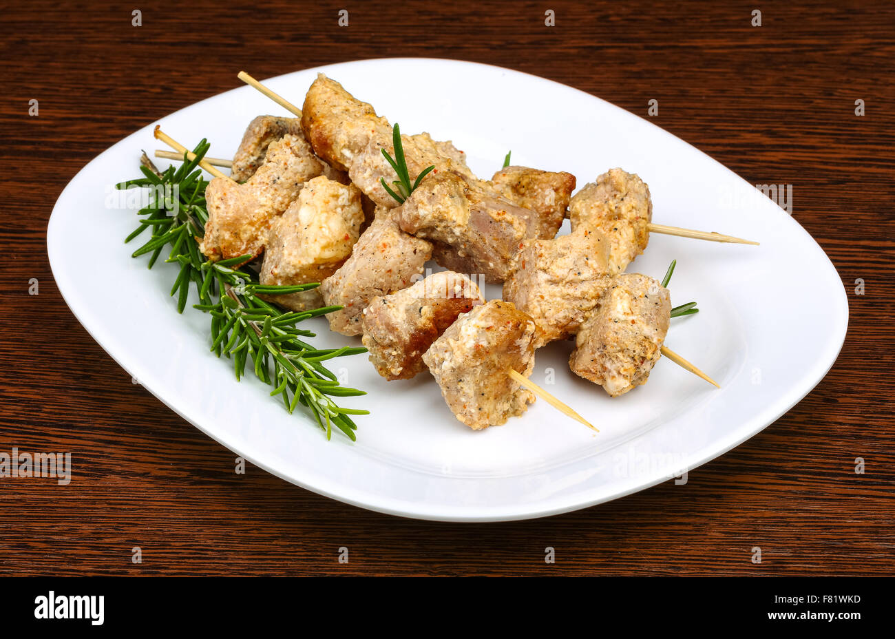 Chicken skewers with rosemary on the wwod background Stock Photo - Alamy