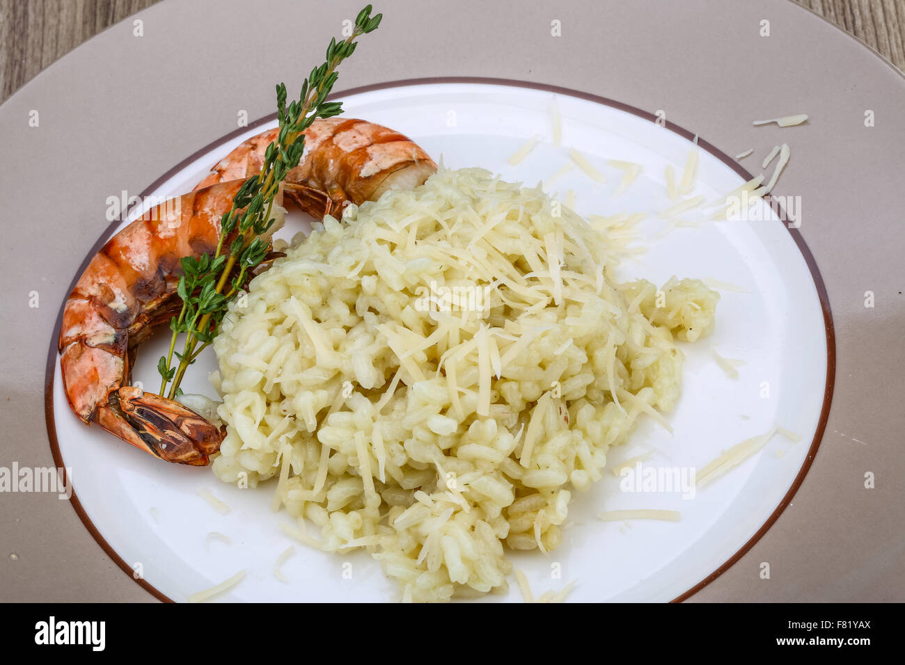 Italian trditional Risotto with tiger prawn and thyme Stock Photo - Alamy