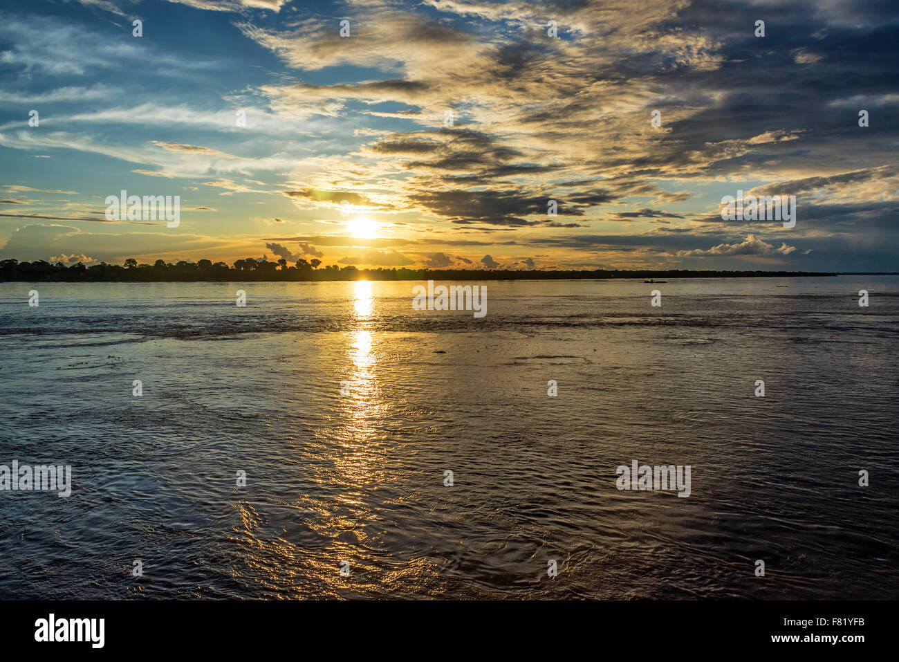 Sunset over the Amazon river near Leticia, Colombia Stock Photo - Alamy