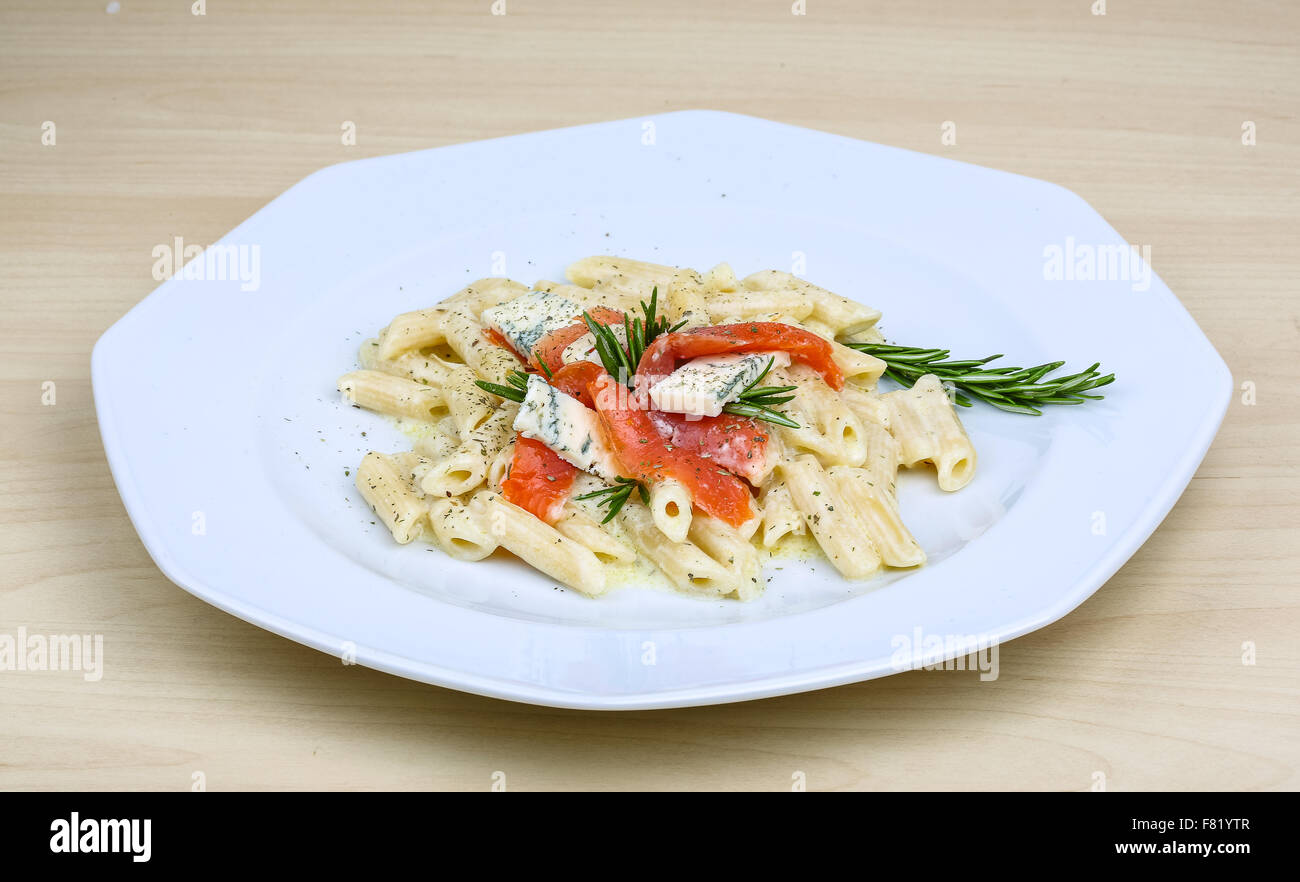 Italian pasta - penne with salmon and blue cheese Stock Photo - Alamy