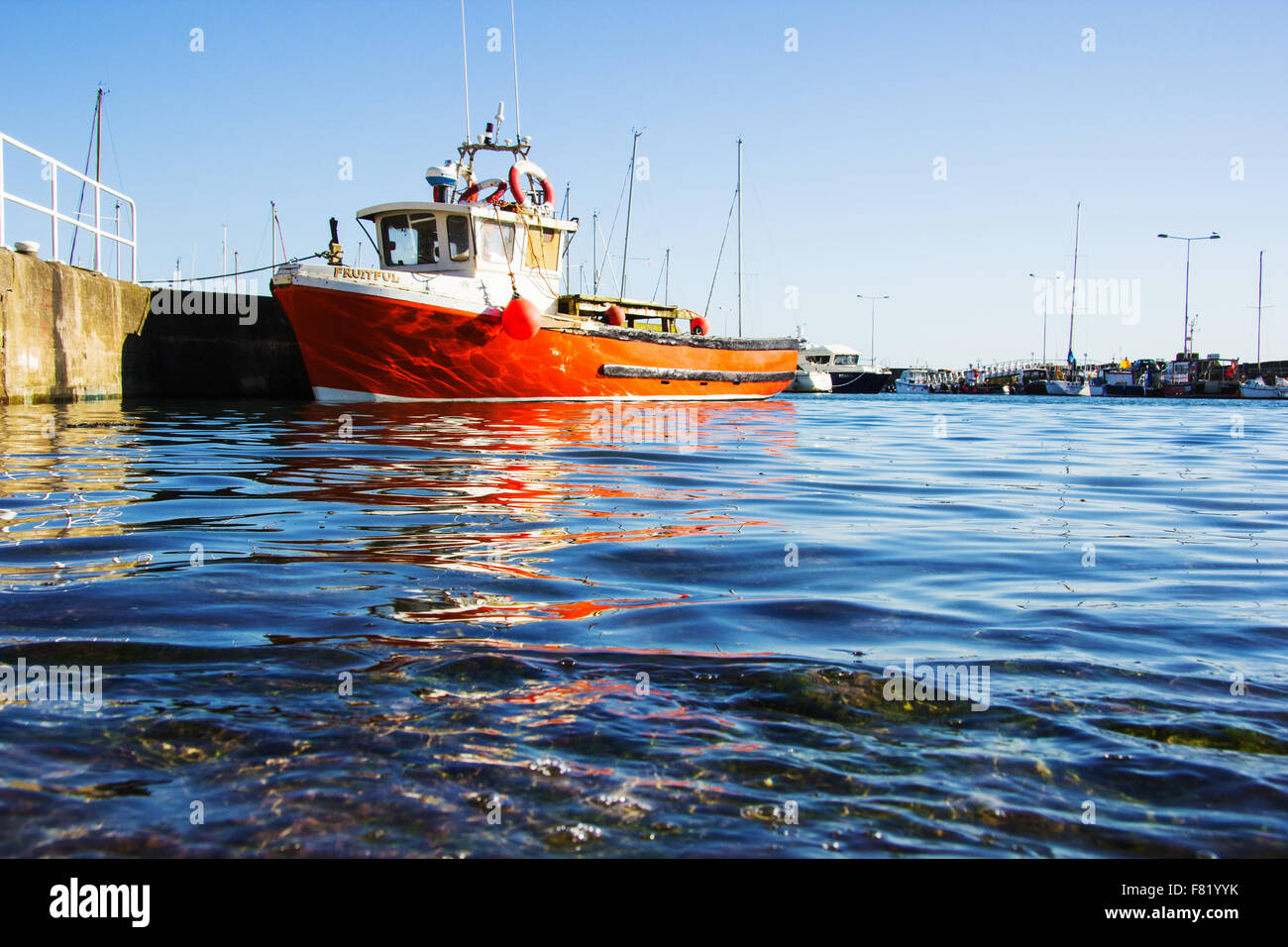 Orange boat sea in hi-res stock photography and images - Alamy