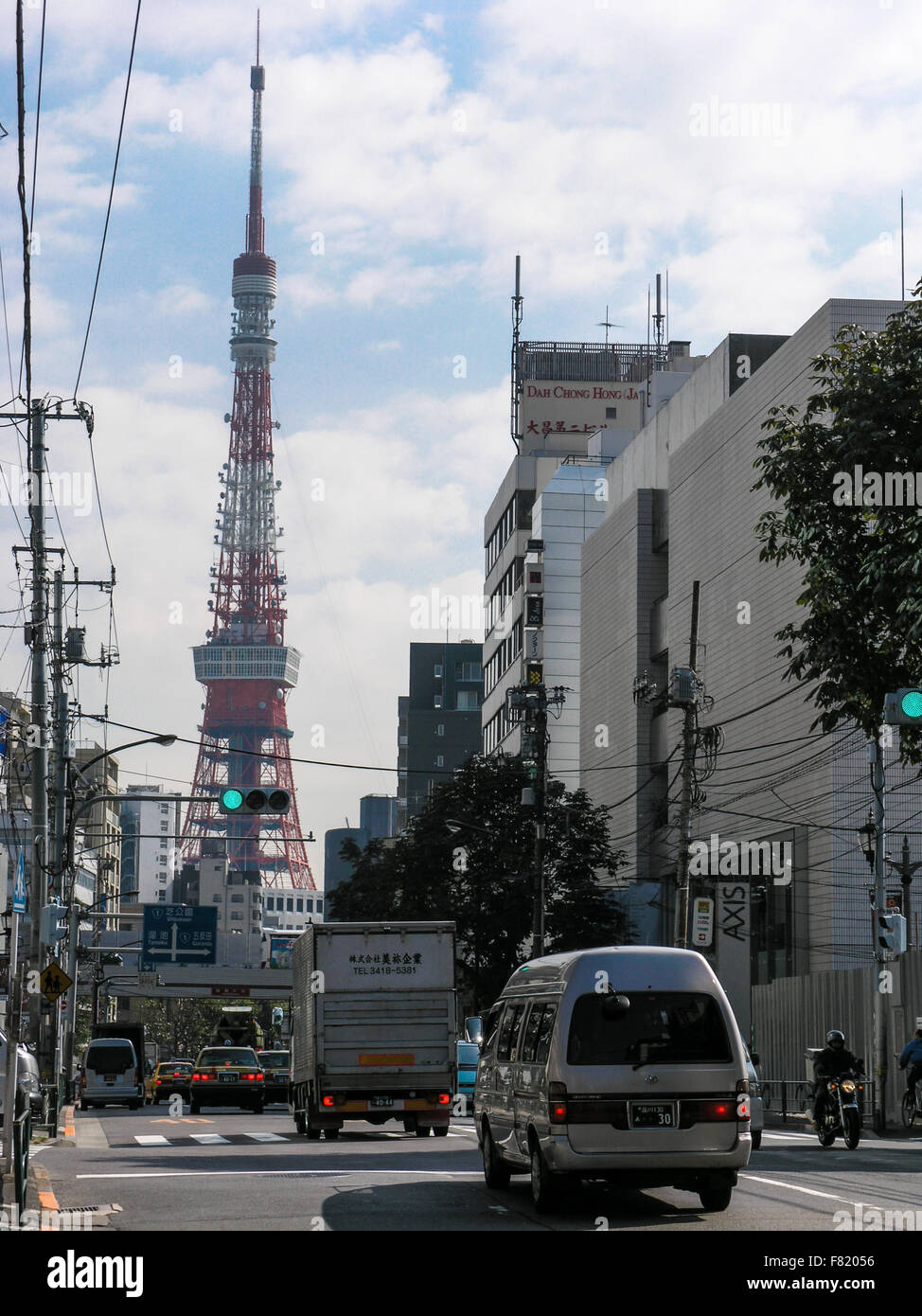 View of a classic Japanese building and the Tokyo Tower, Japan Stock ...