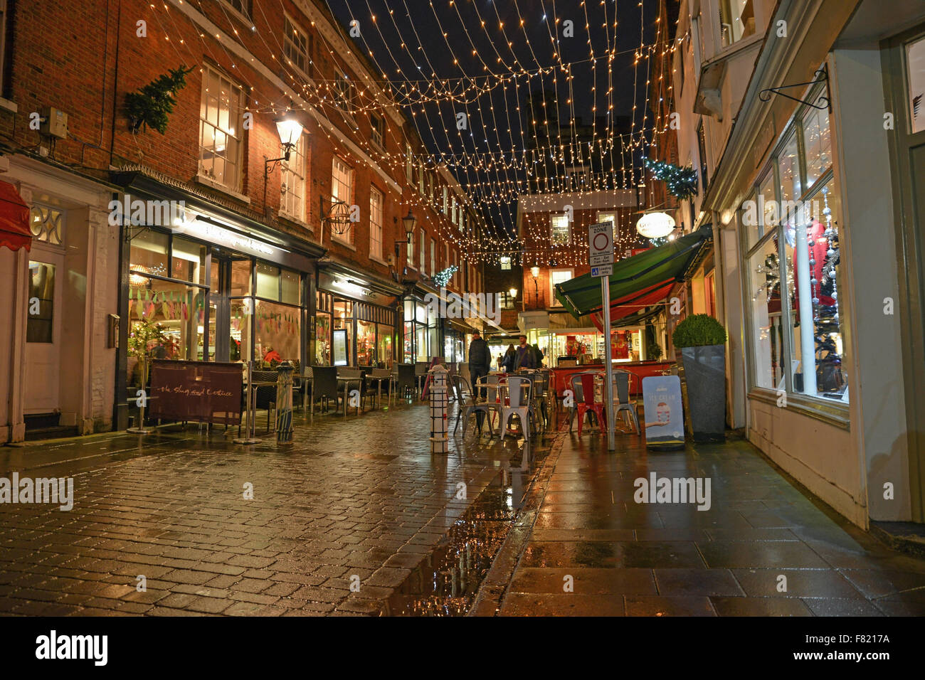 Wet Cobblestone street at nighttime in Winchester Hampshire United ...