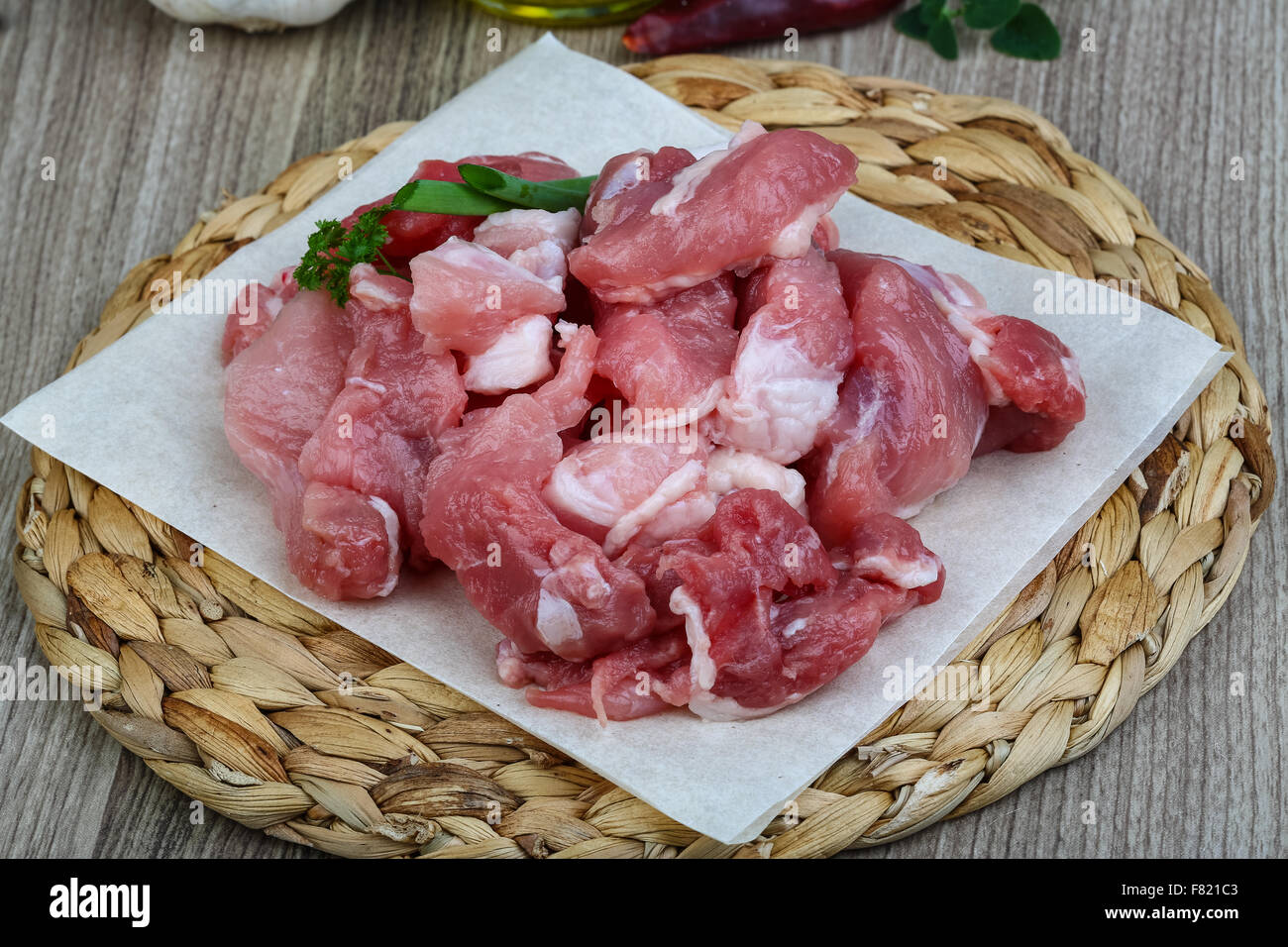 Raw Diced pork meat - ready for cooking Stock Photo - Alamy