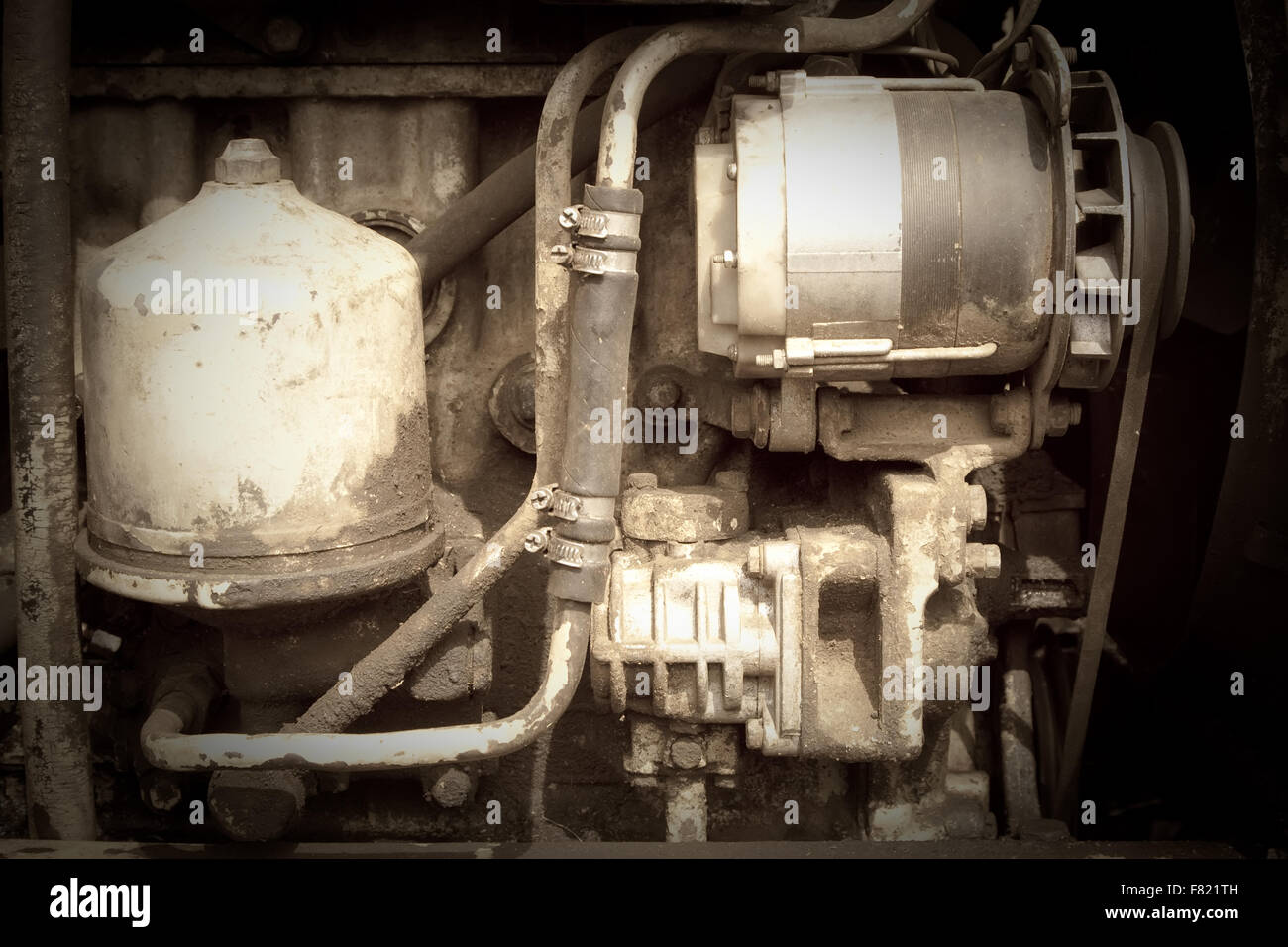Vintage photo of battered old farm tractor engine Stock Photo - Alamy