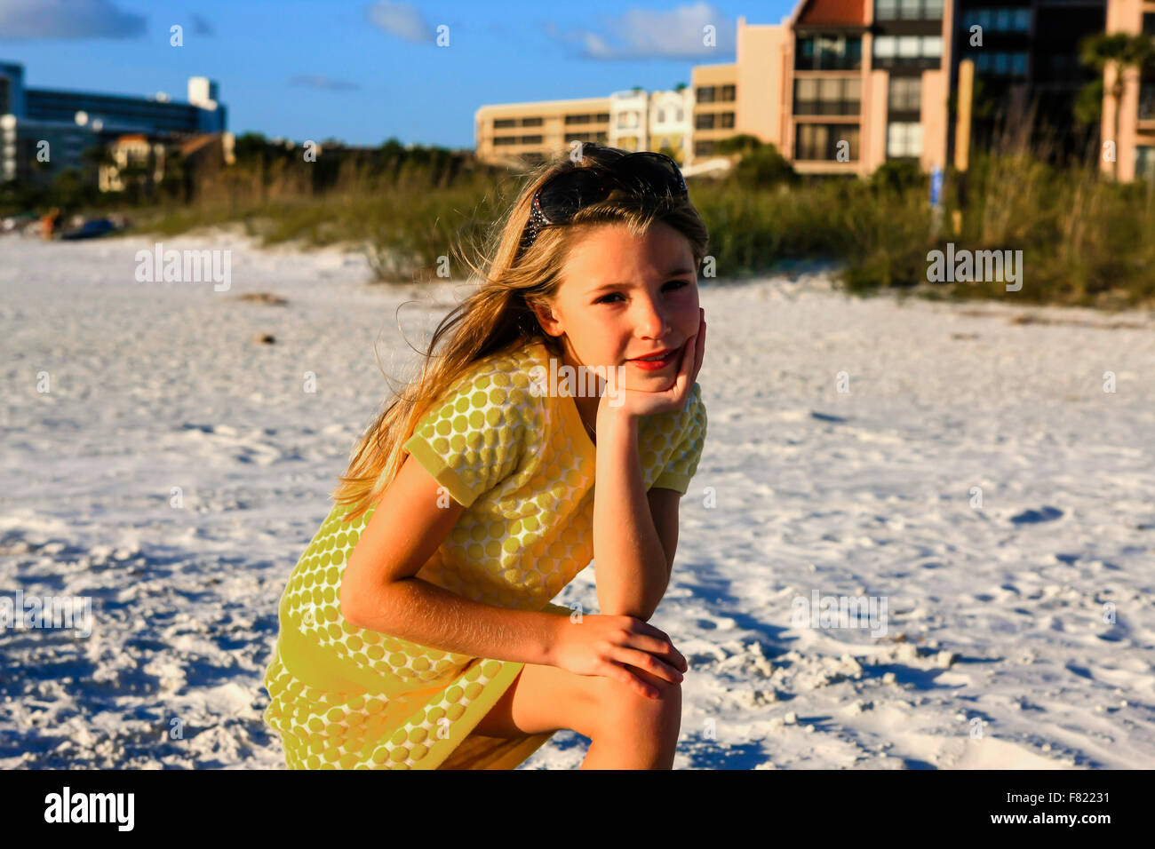 Young Girl Posing At Sunset By The Sand Castle She Built On Siesta Key