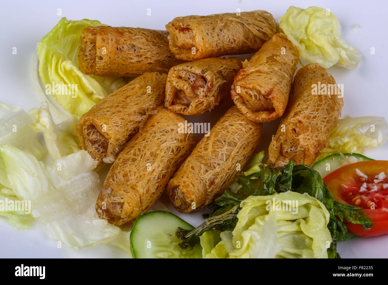 Asian traditional spring rolls on the wood background Stock Photo - Alamy