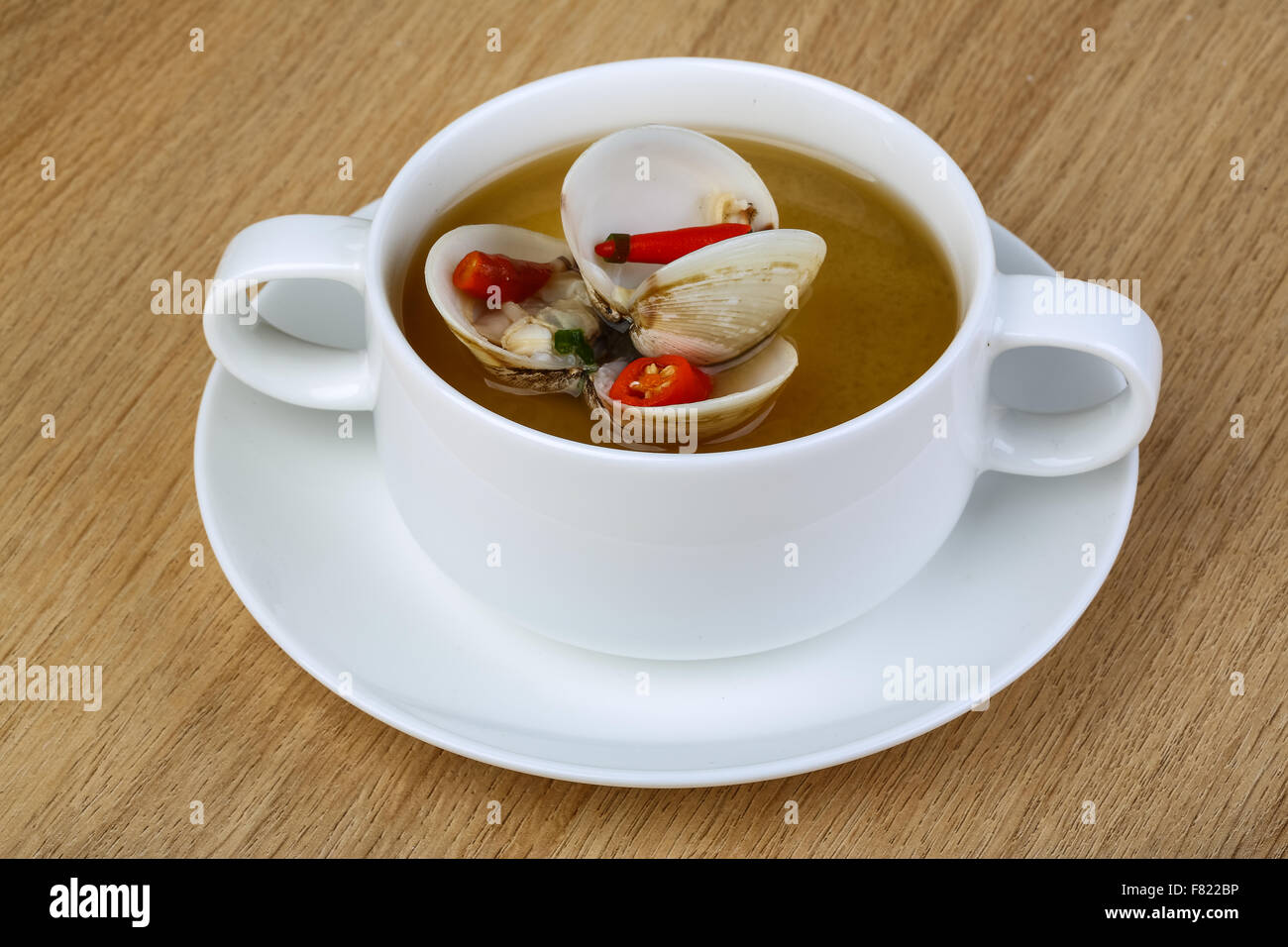 Asian traditional Shell soup on the wood background Stock Photo - Alamy