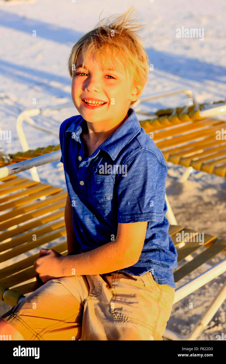 Portrait photo of a seven year old boy on Siesta Key beach at sunset in ...