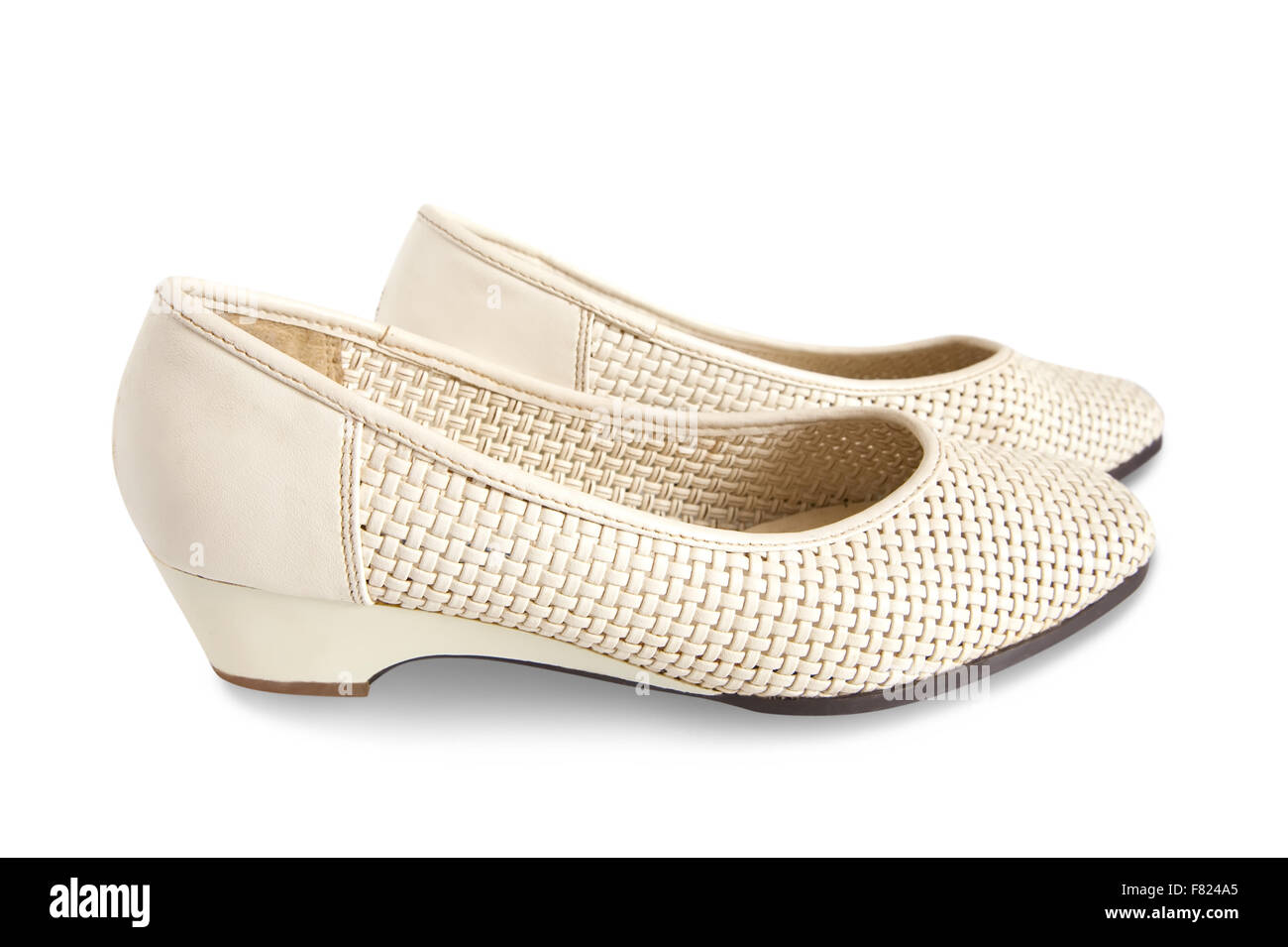 Beige female shoes isolated on white background Stock Photo - Alamy
