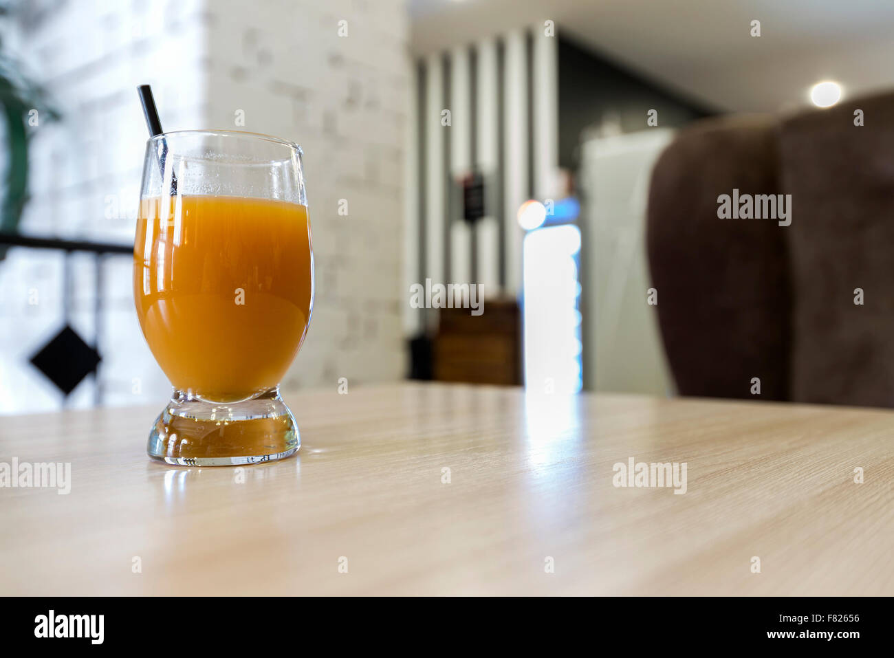 Fruit juice on table in a cafe Stock Photo - Alamy