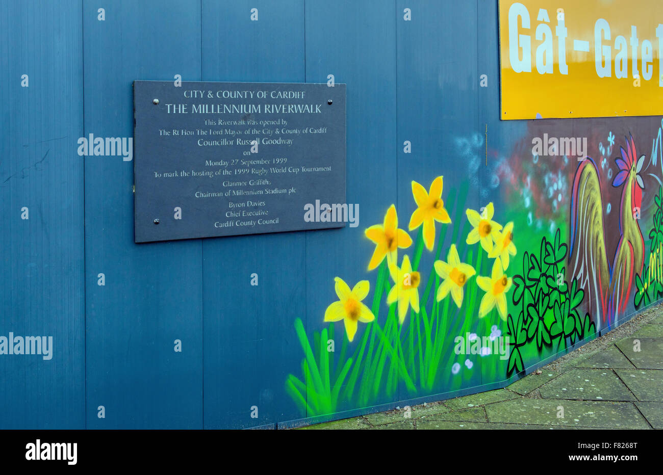 Graffiti along the Millennium Riverwalk in Cardiff, showing part of the ...