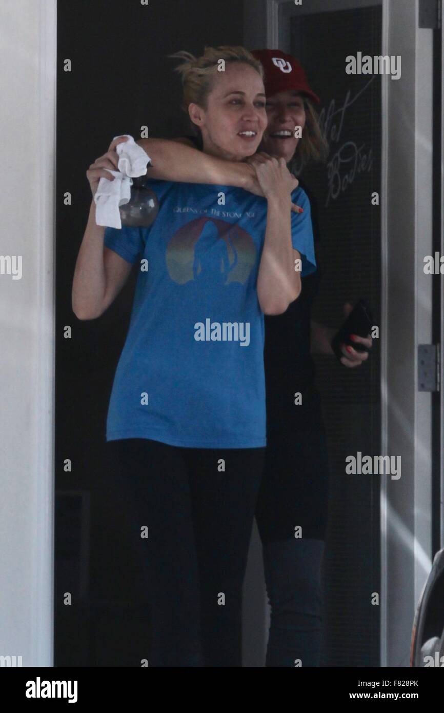 Chelsea Handler jokes around with a friend as she leaves the gym ...