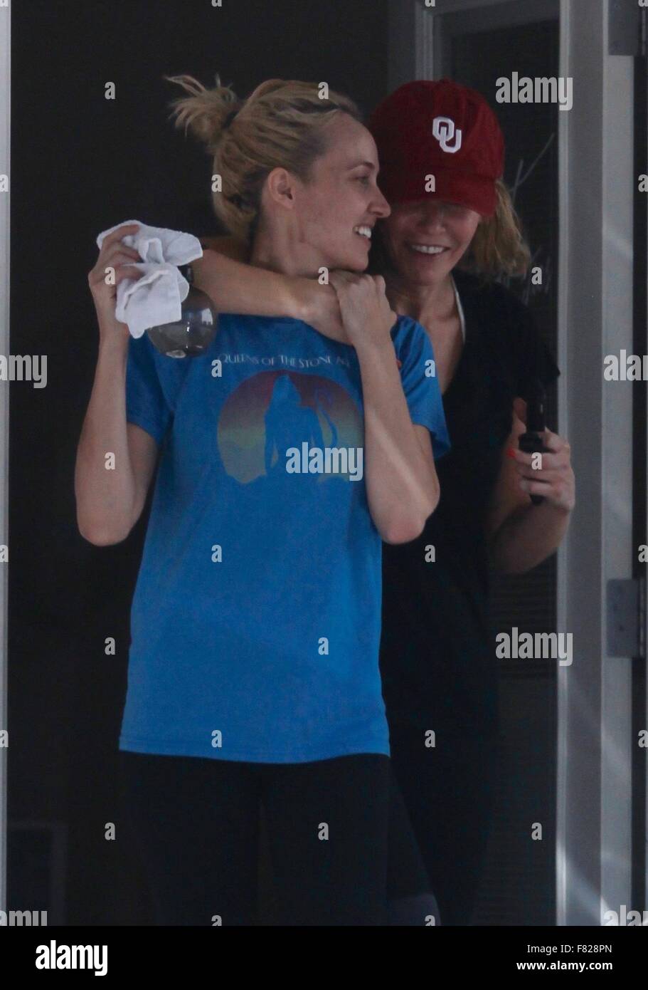 Chelsea Handler jokes around with a friend as she leaves the gym ...