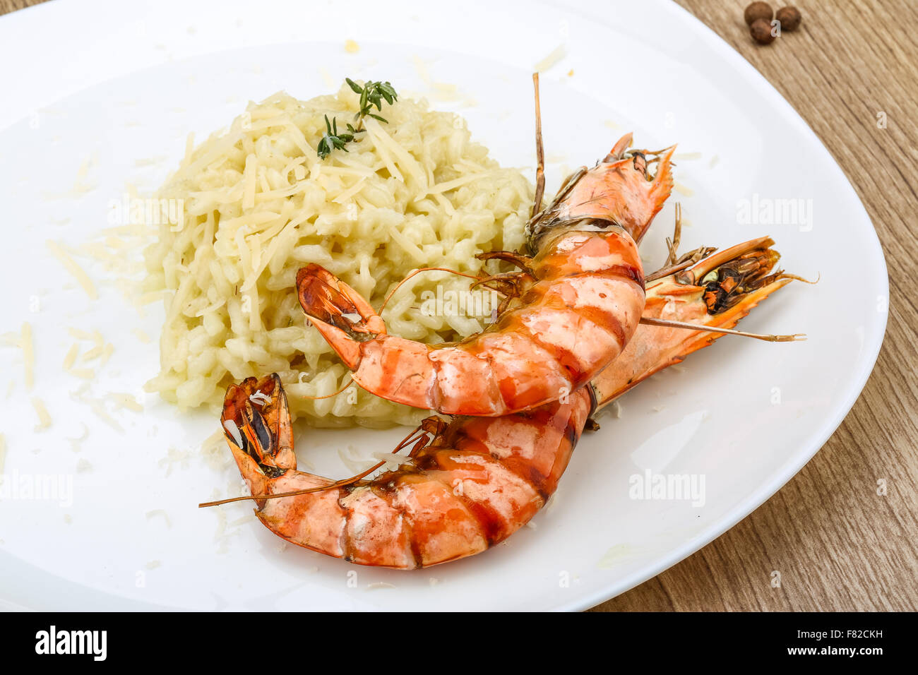 Italian trditional Risotto with tiger prawn and thyme Stock Photo - Alamy