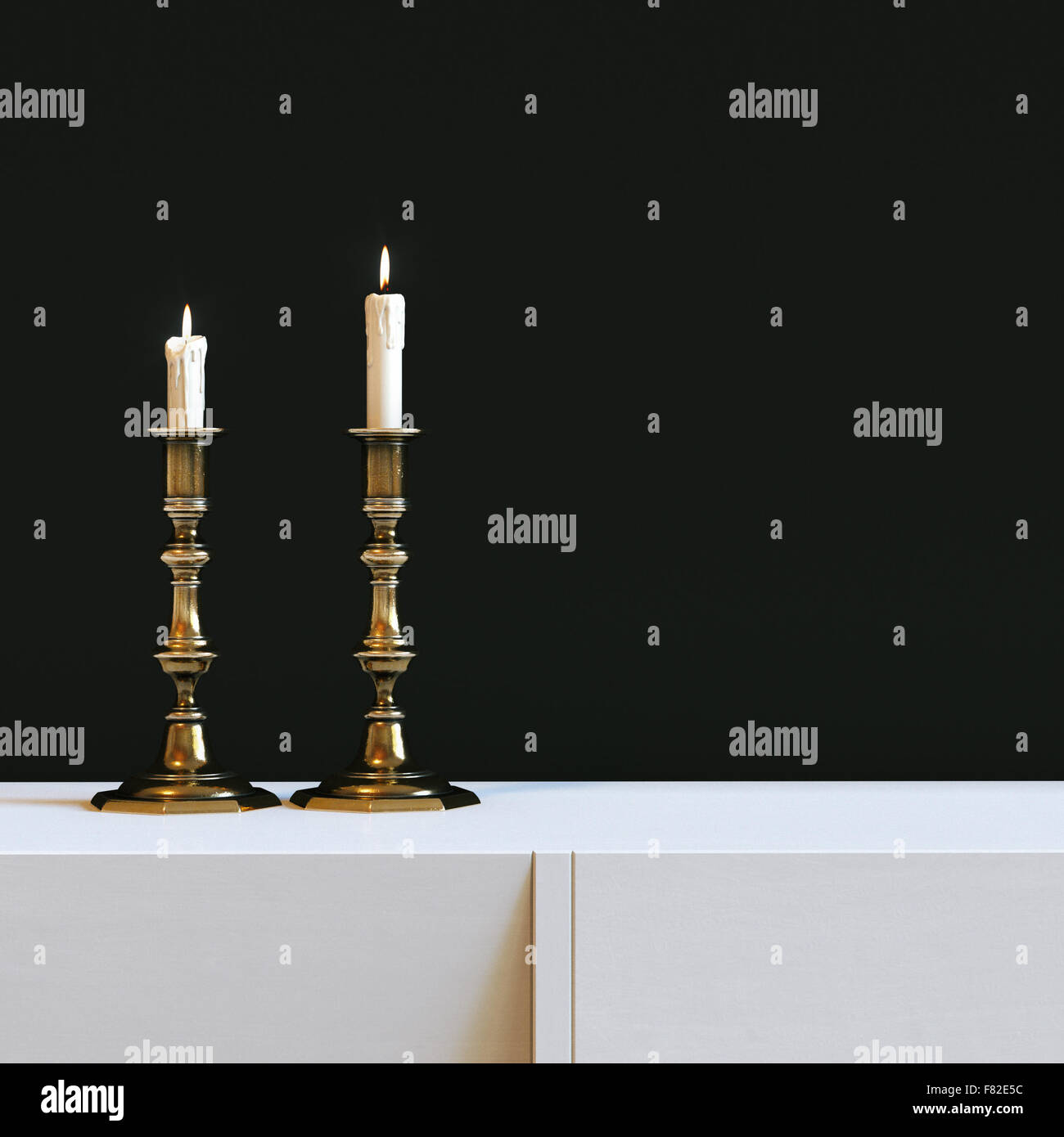 Vintage golden candlestick with burning candles in black interior. 3d ...