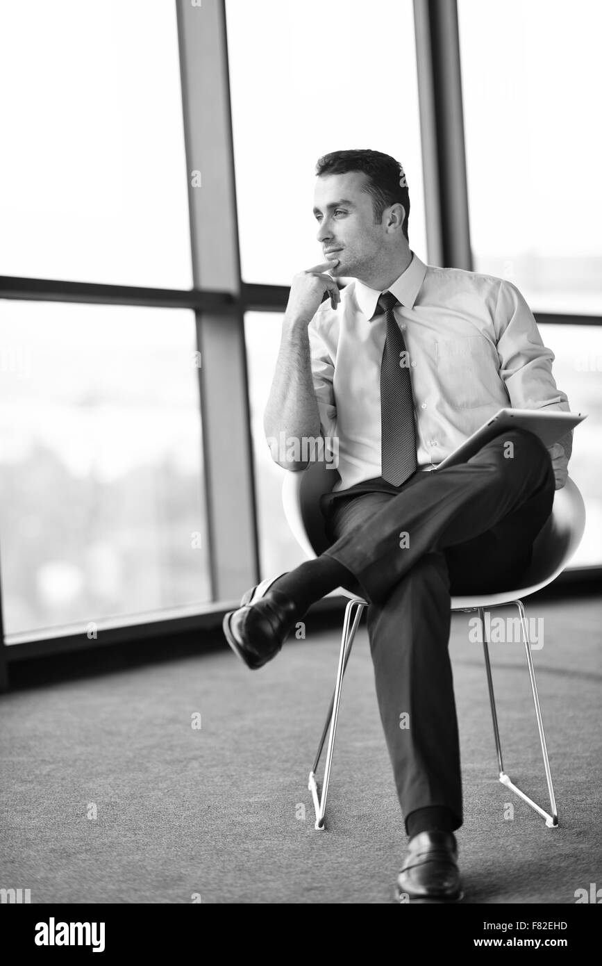 Business man in window office Black and White Stock Photos & Images - Alamy