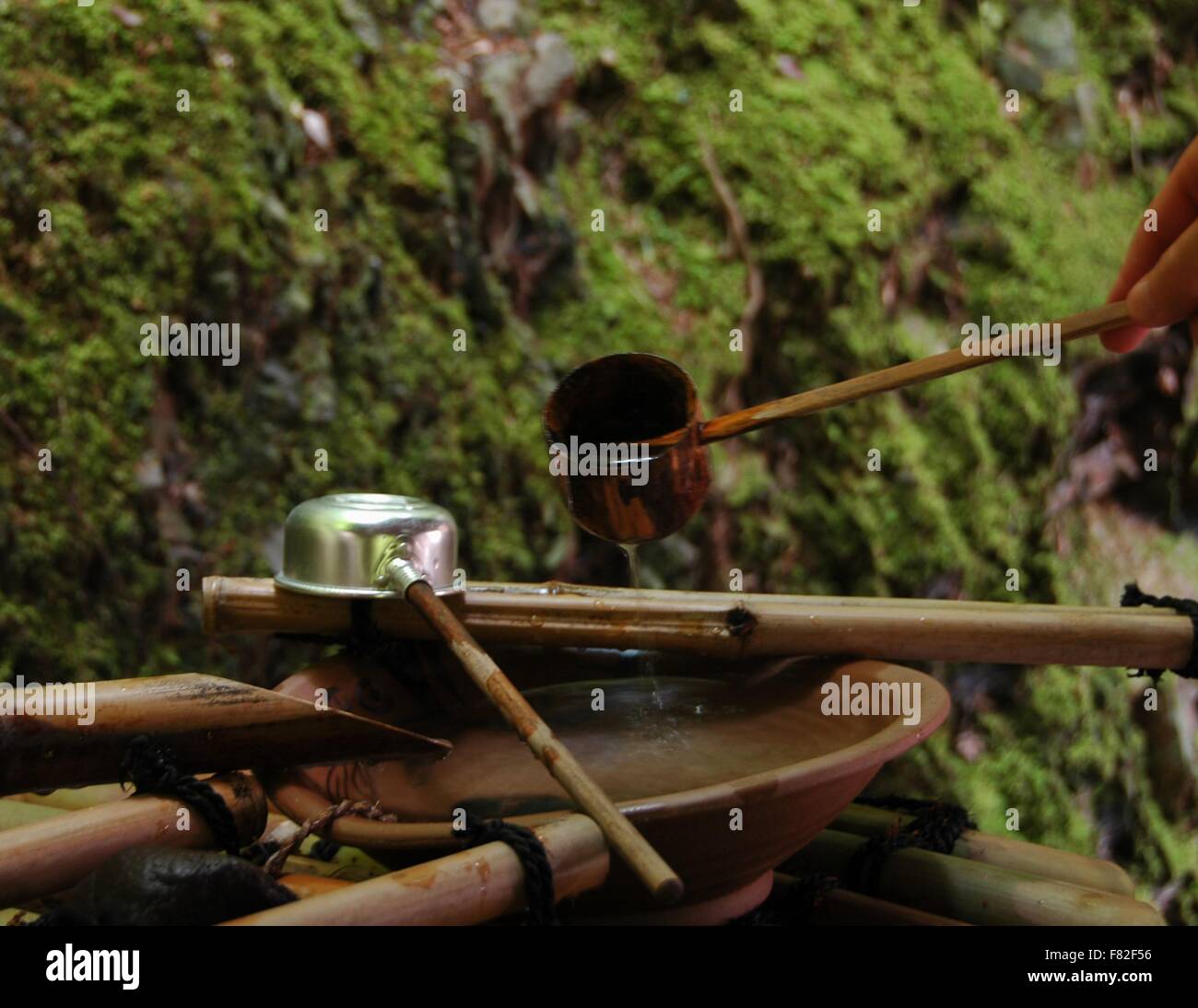 Bamboo spout hi-res stock photography and images - Alamy